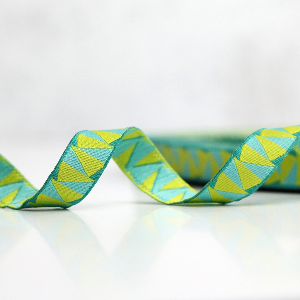 Segmented Stem On Amazon Green Ribbon | Sue Spargo Folk Art Quilts